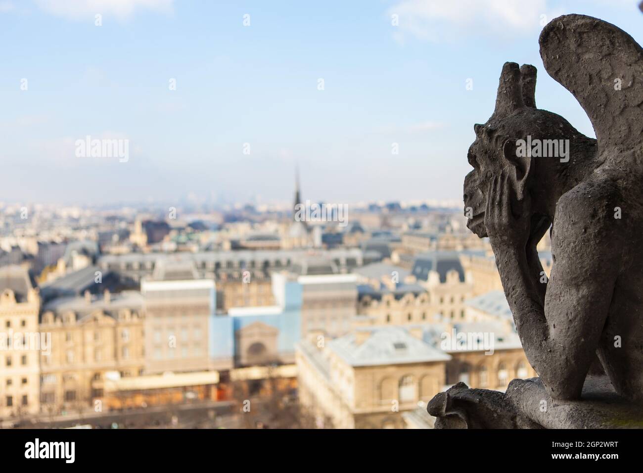 Notre Dame of Paris: Famous Chimera (demon) overlooking the Eiffel ...