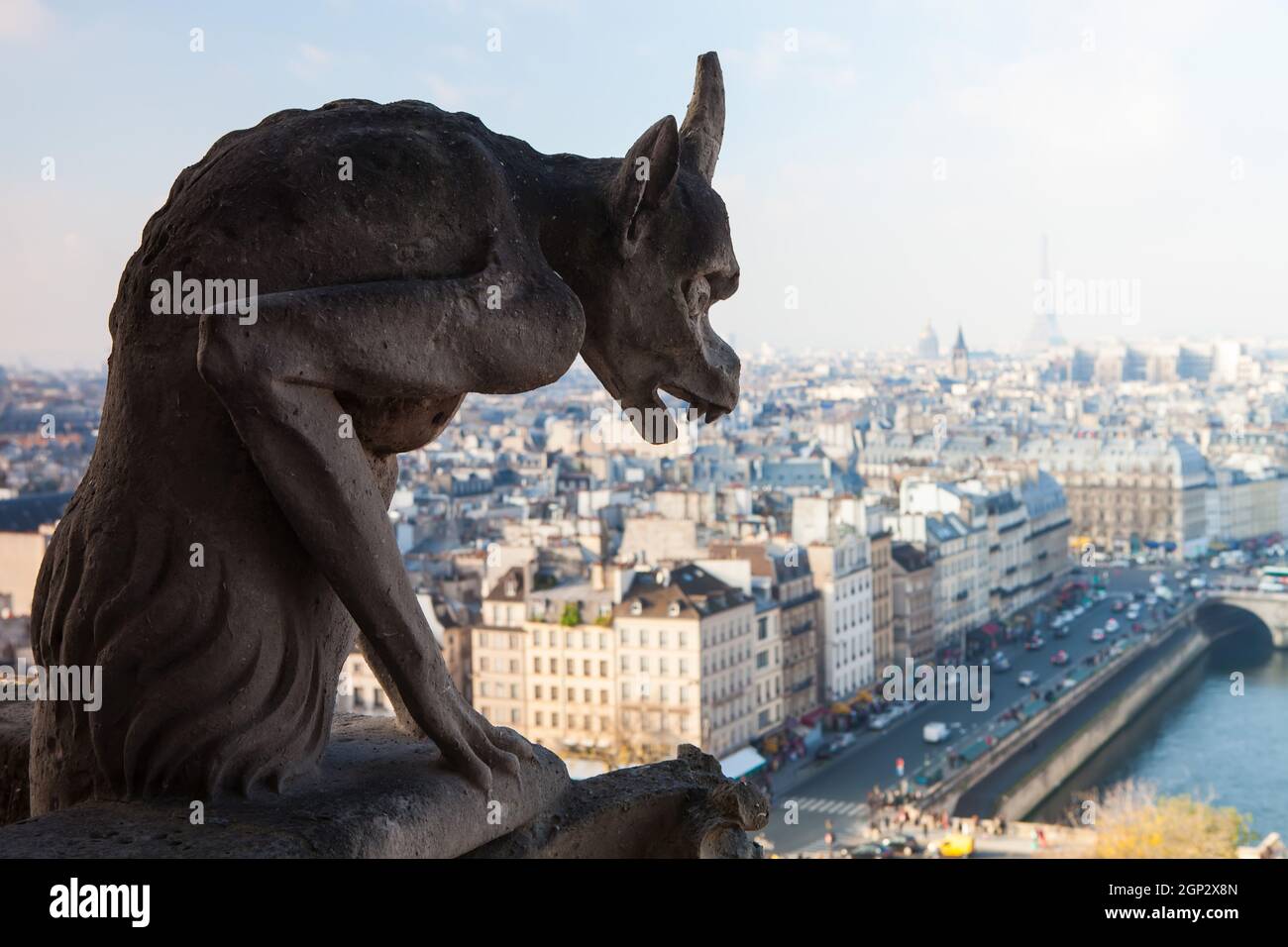 Notre Dame of Paris: Famous Chimera (demon) overlooking the Eiffel ...