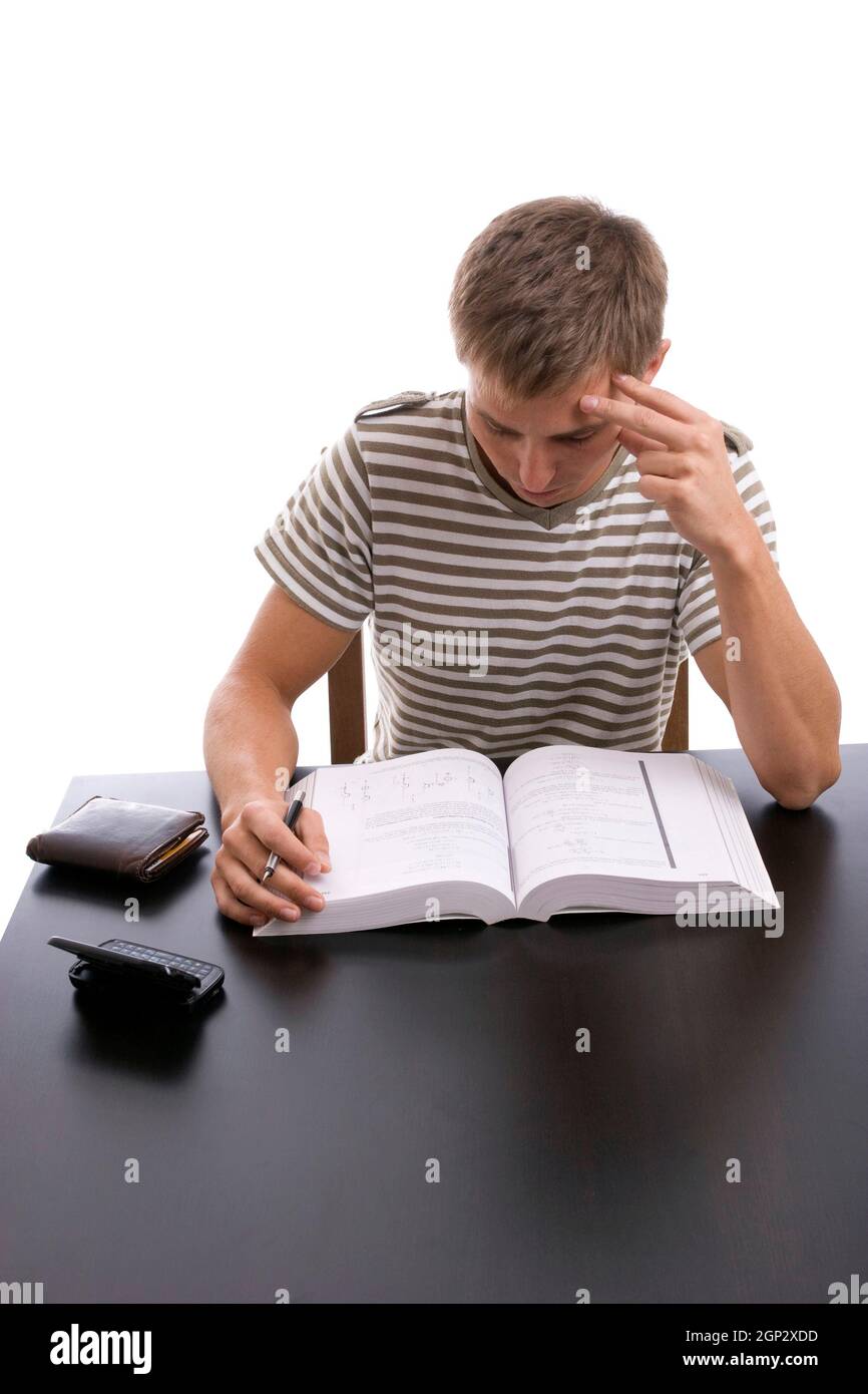 Young boy studying, isolated over white background Stock Photo - Alamy