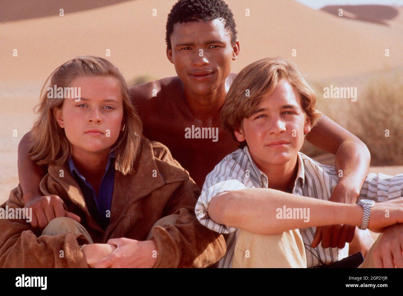 A FAR OFF PLACE, from left: Reese Witherspoon, Sarel Bok, Ethan Randall ...