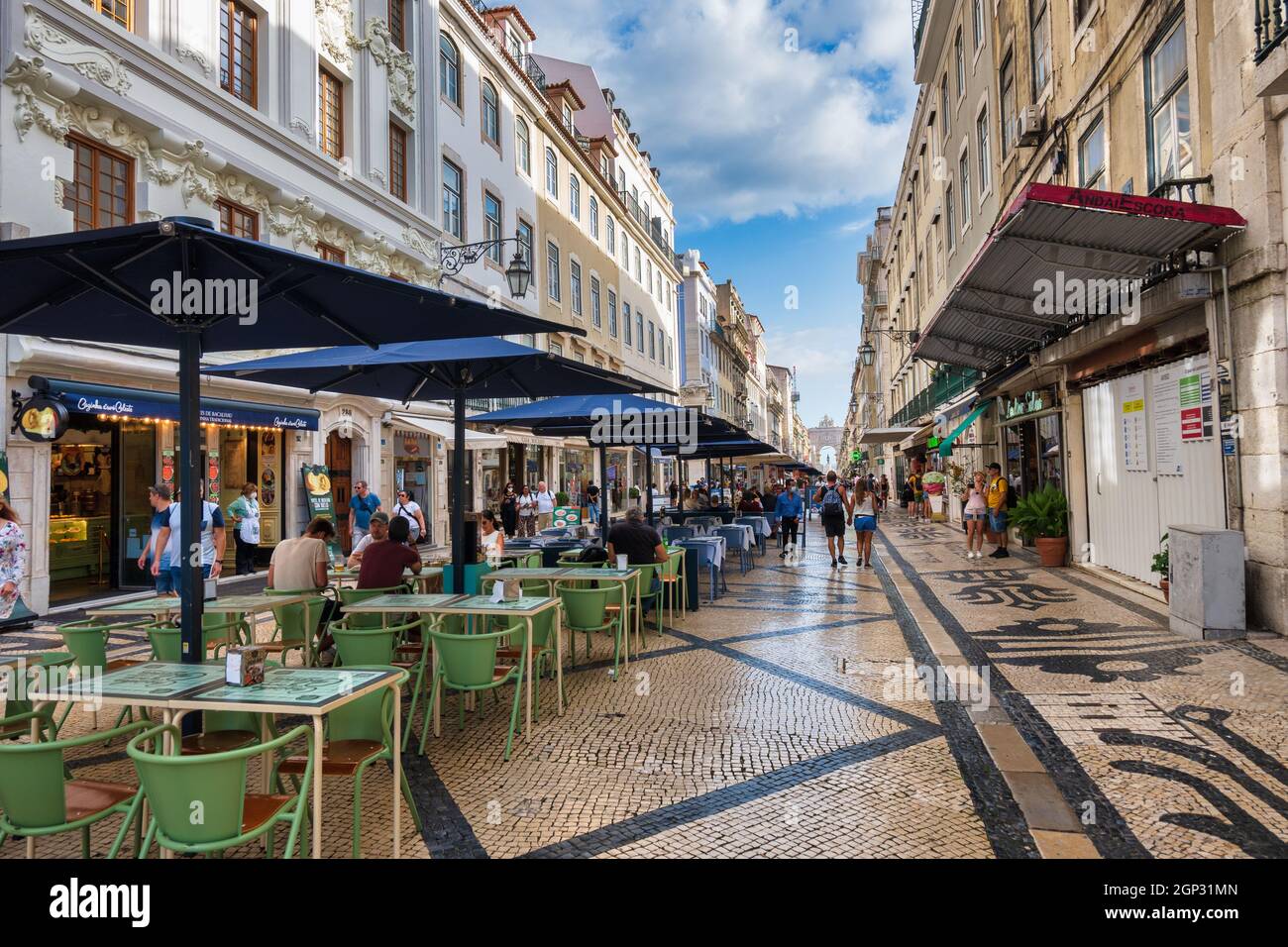 Outdoor cafes and people walking along the busy Augusta street in ...