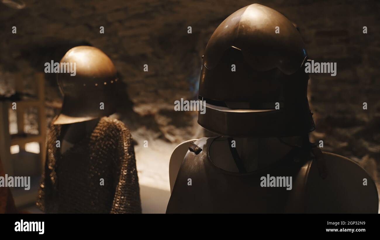 Medieval chain mail with a helmet in the museum Stock Photo - Alamy