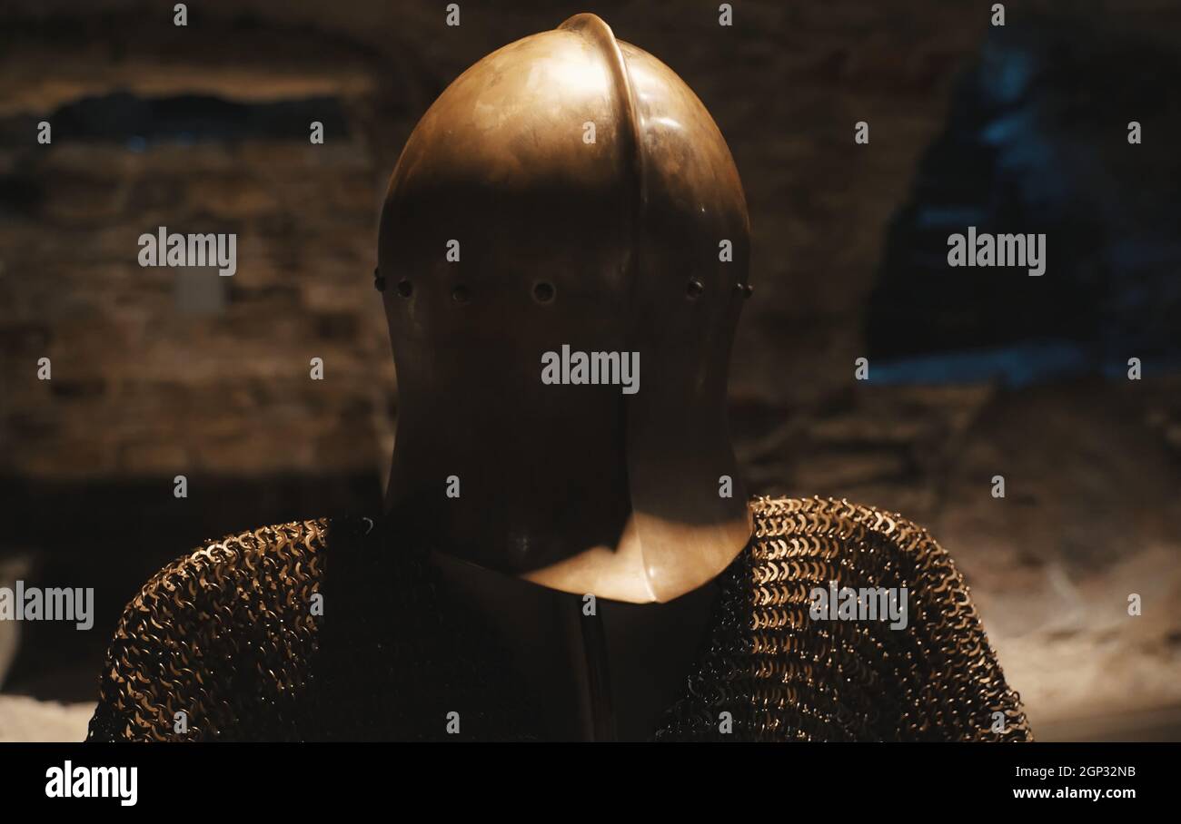 Medieval chain mail with a helmet in the museum Stock Photo - Alamy