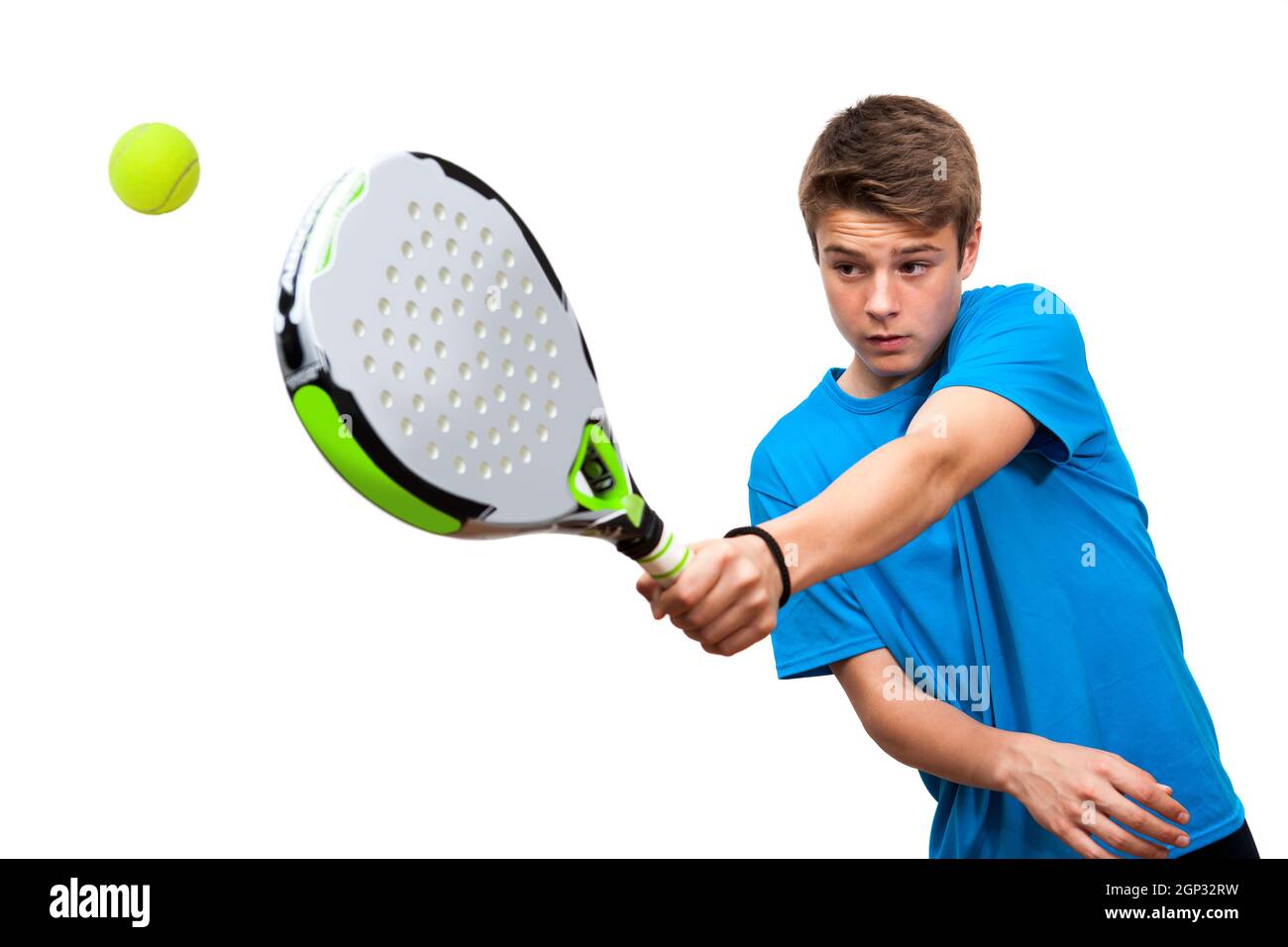 Close up of teen boy paddle player in action isolated against white ...