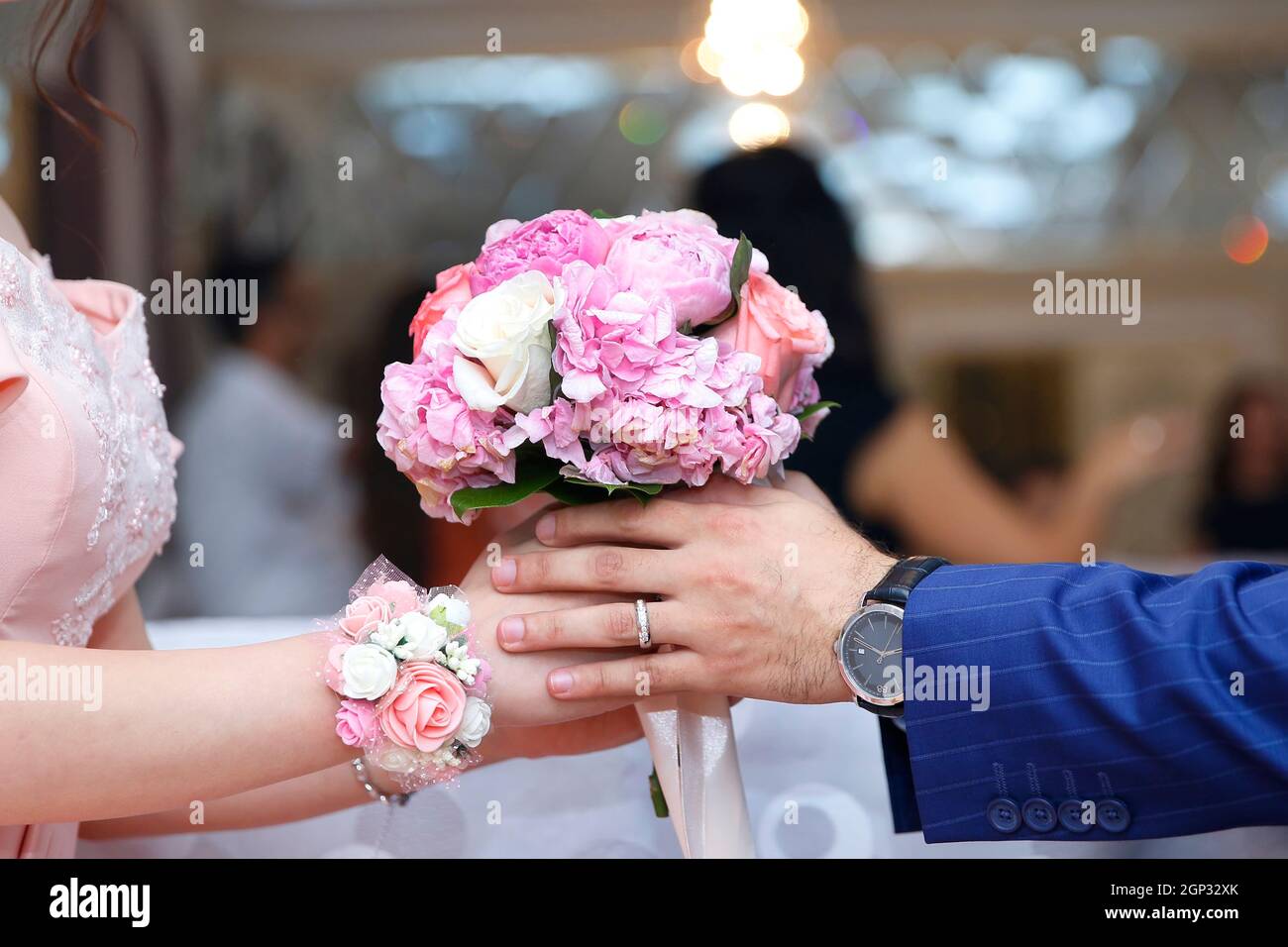 Man putting engagement ring on fiancee finger,young couple is getting ...