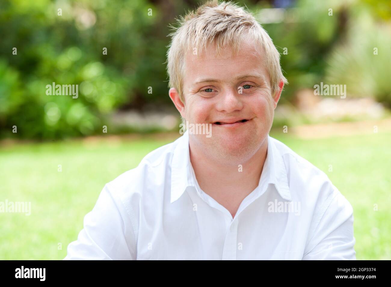Boy with down syndrome hi-res stock photography and images - Alamy