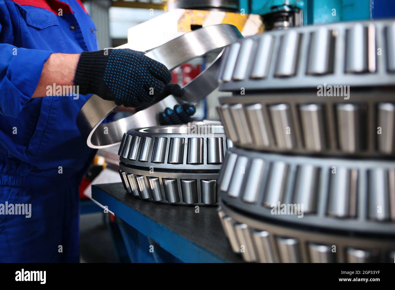 Packaging of finished products in the production of bearings. Photo ...