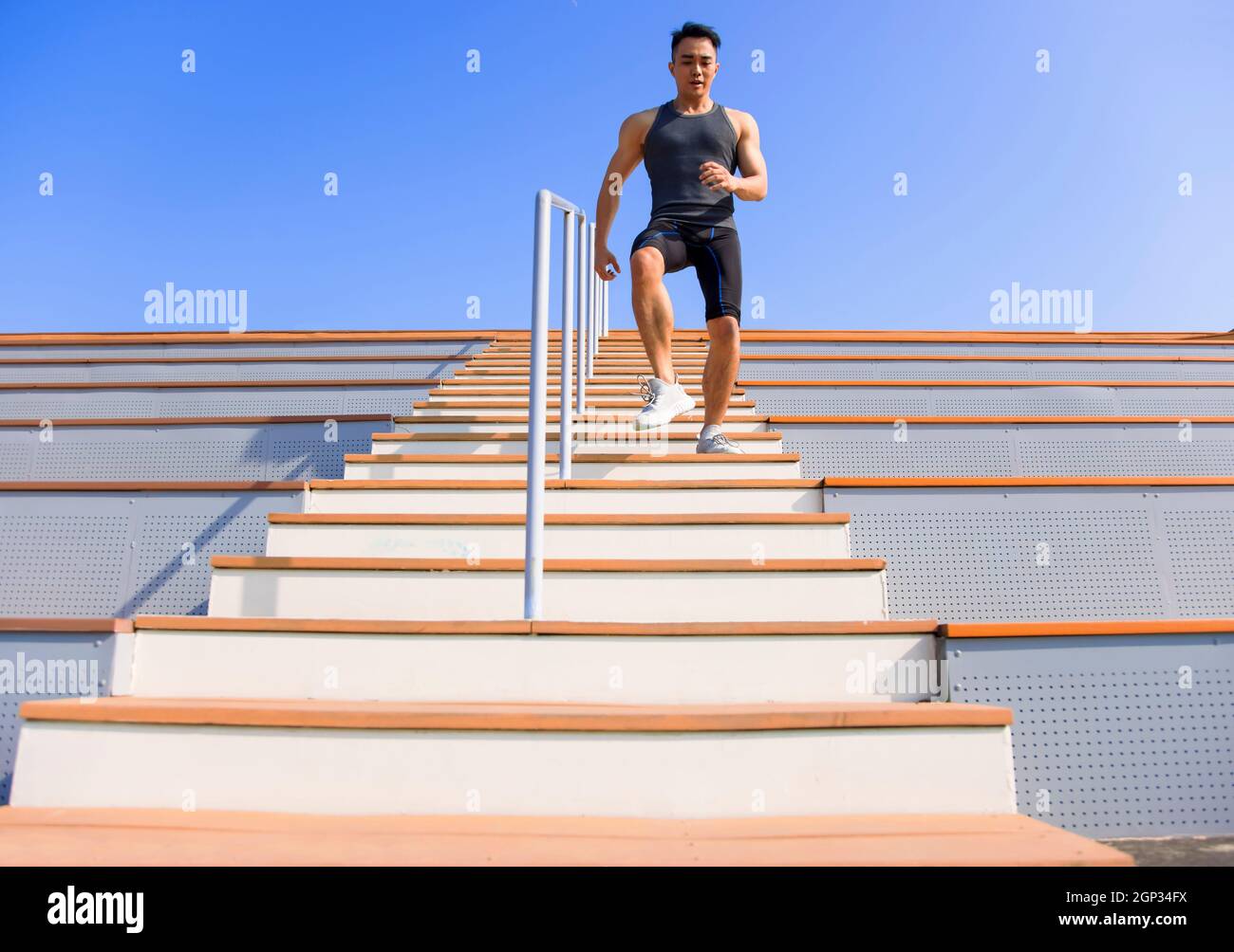 Man running downstairs hi-res stock photography and images - Alamy