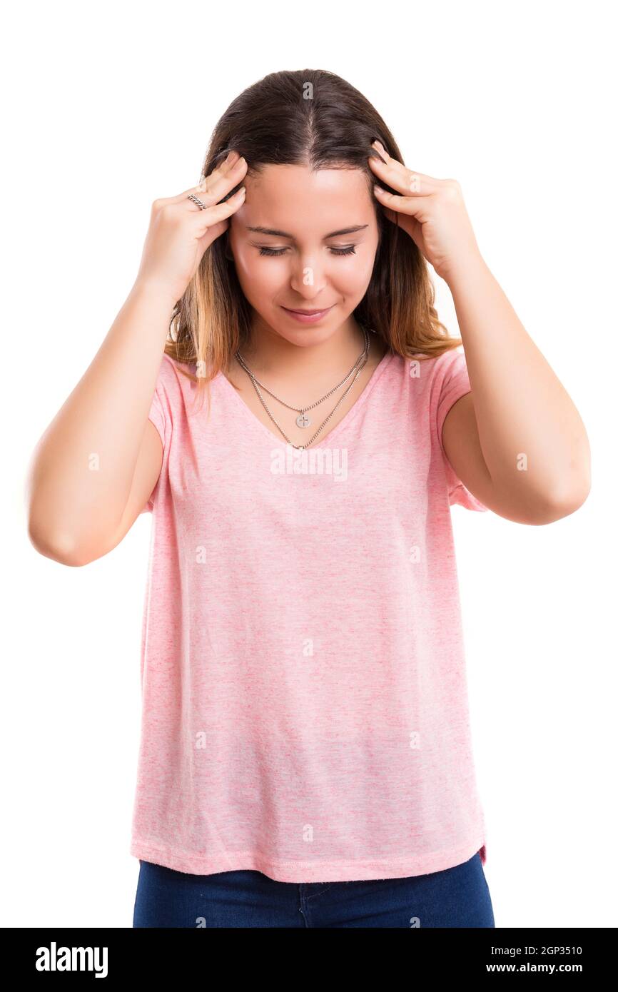 Young woman with a strong headache, isolated over white background ...