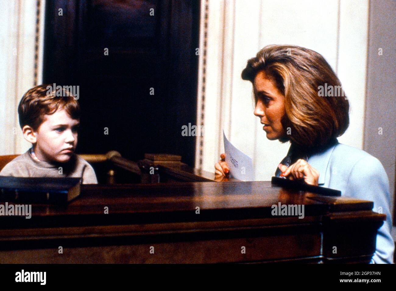 PRESUMED INNOCENT, from left: Joseph Mazzello, Greta Scacchi, 1990 ...