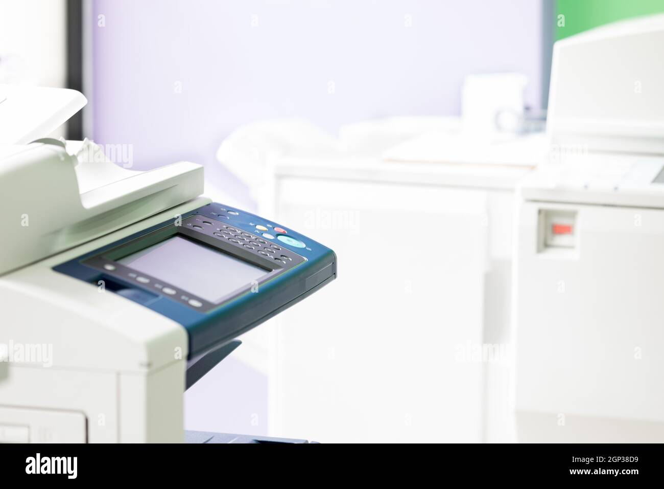 Detail of a modern digital printer of a copy center Stock Photo - Alamy