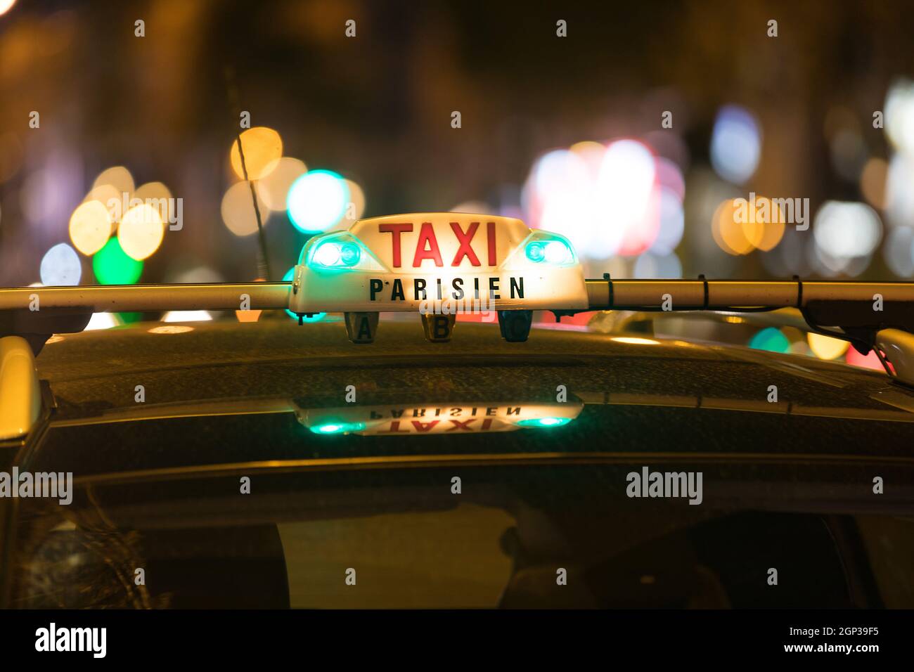 French taxi with the champs elysees avenue in background Stock Photo ...