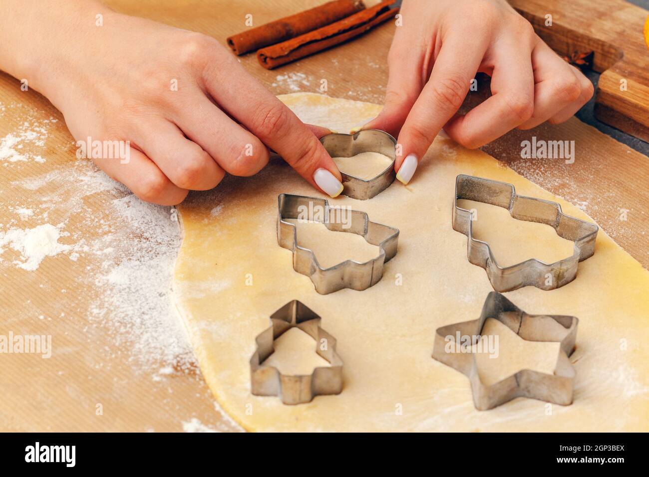 female hands making cookies from fresh dough at home Stock Photo - Alamy