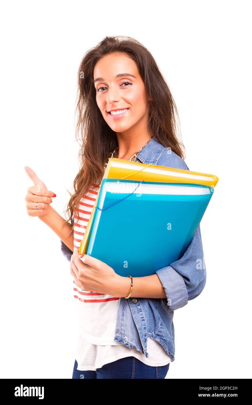 Young student woman posing over white background Stock Photo - Alamy
