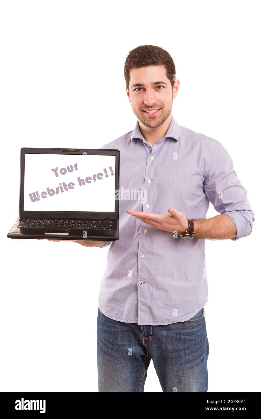 Young man presenting your product in a laptop computer Stock Photo - Alamy