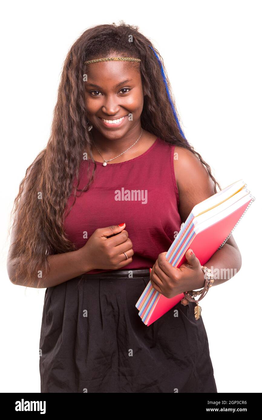 Beautiful african student woman posing isolated over white background ...