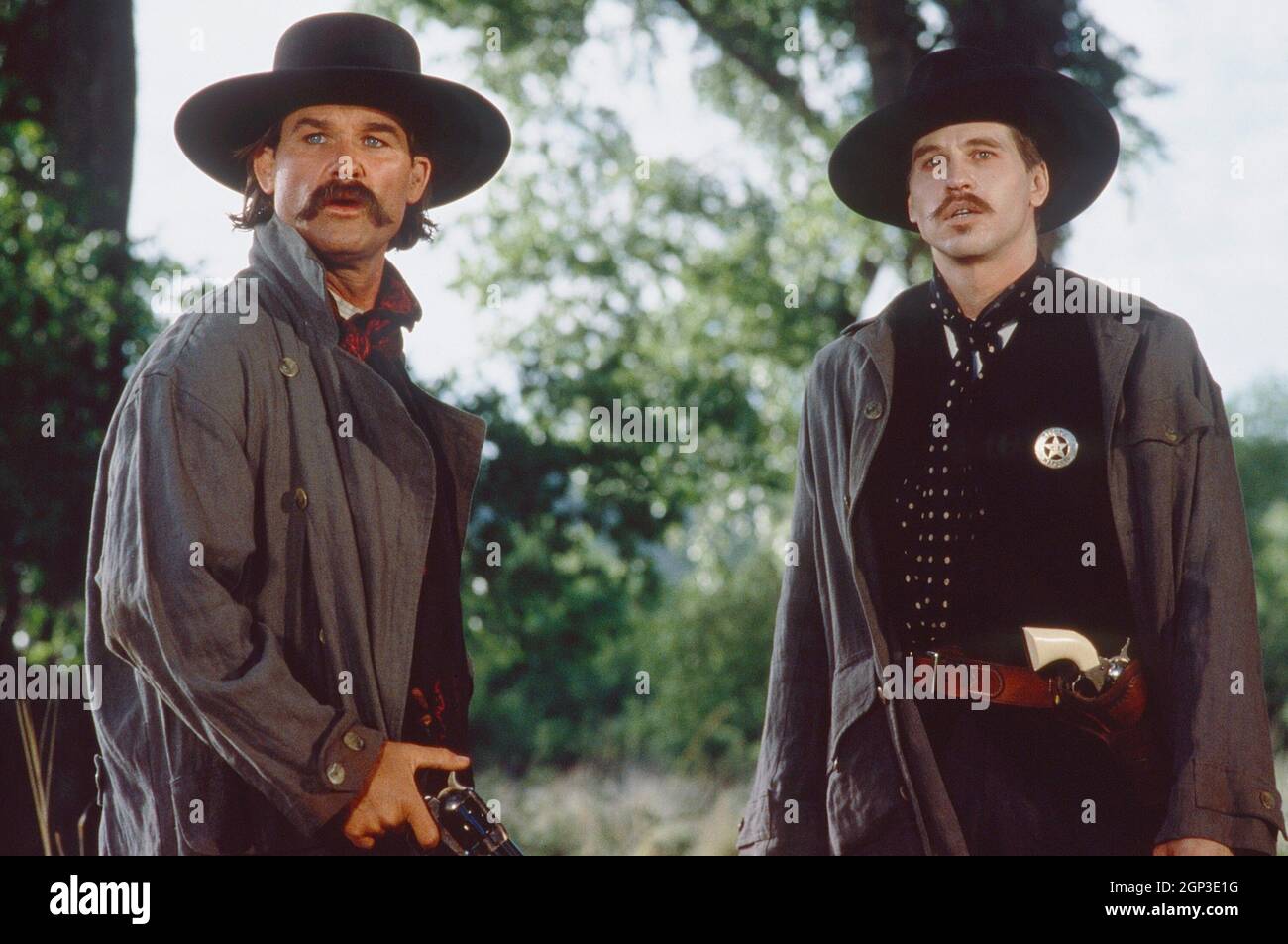 TOMBSTONE, from left: Kurt Russell, Val Kilmer, 1993. ph: John Bramley ...