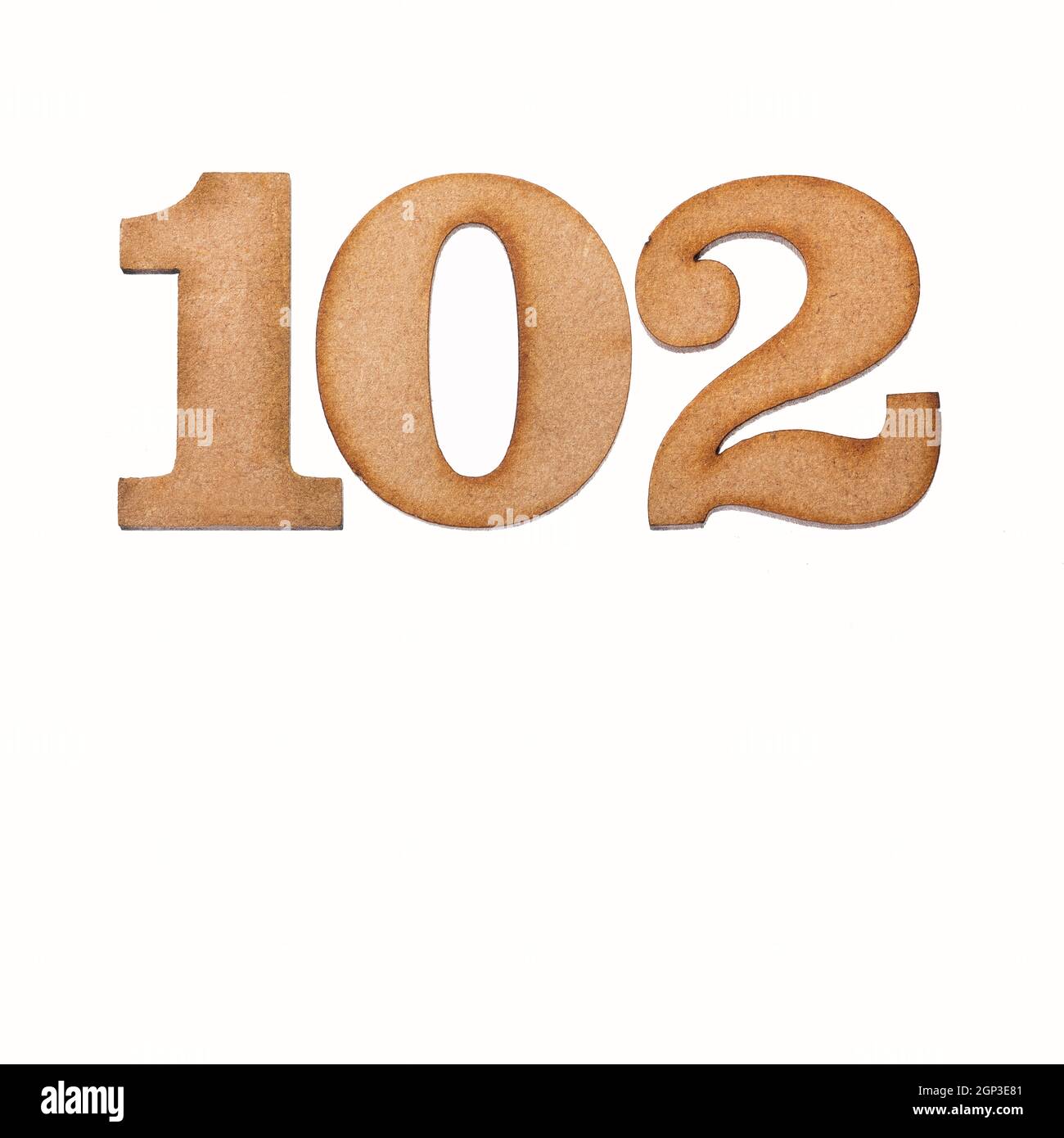 Number 102 in wood, isolated on white background Stock Photo - Alamy