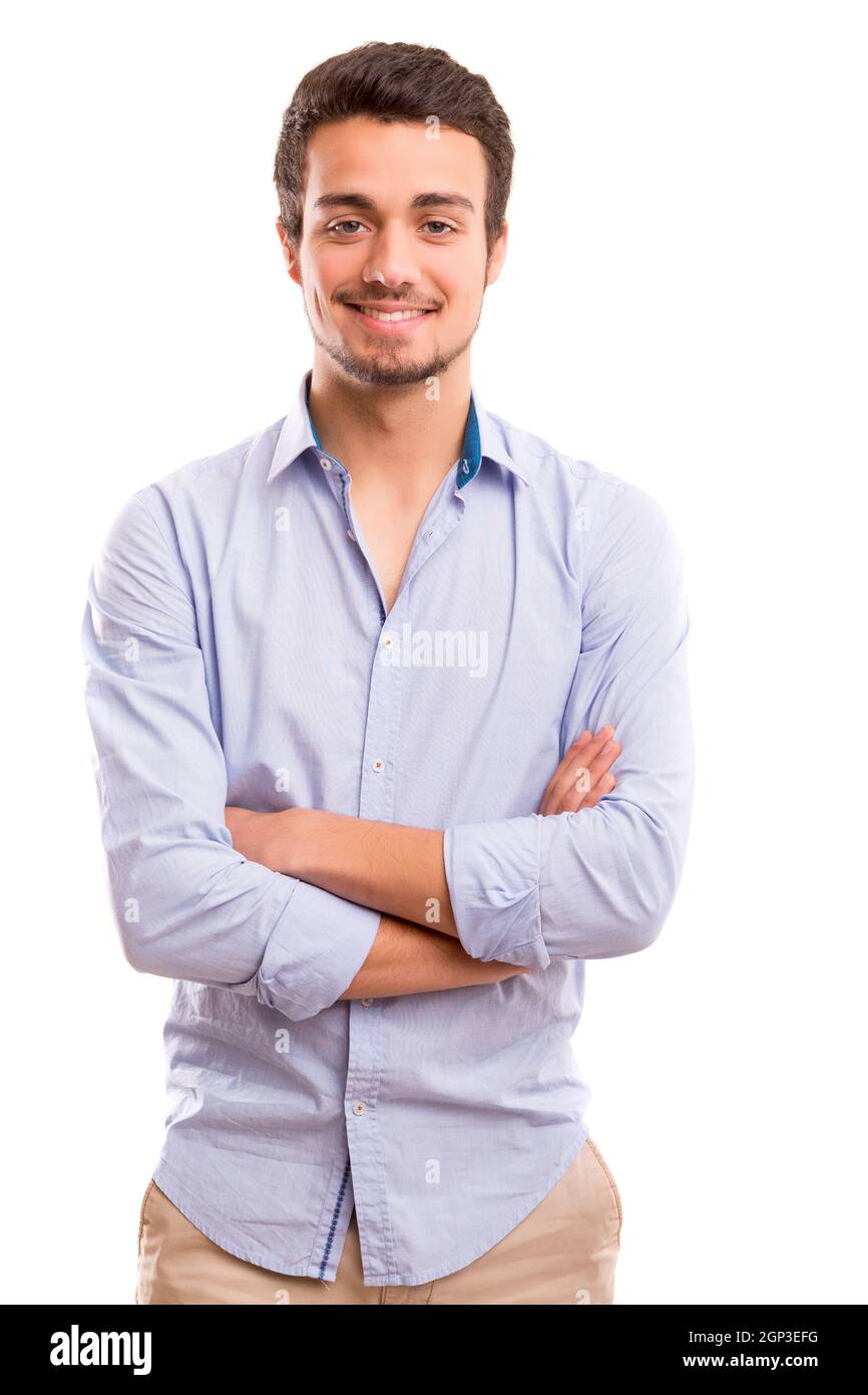 Studio picture of a young and handsome man posing isolated Stock Photo ...