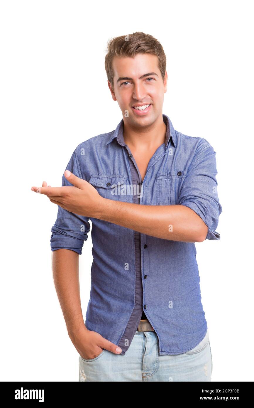 Young man presenting your product, isolated over a white background ...