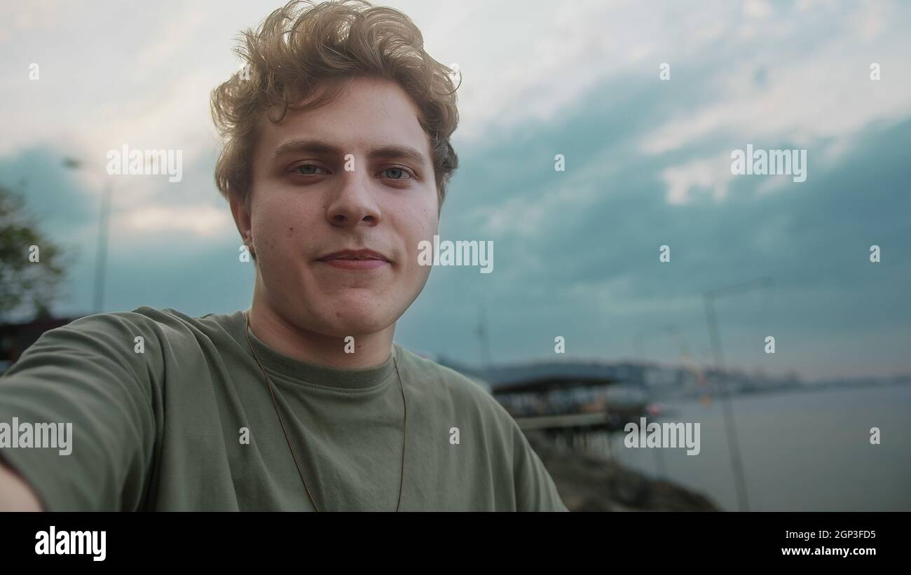 Young blond boy making video call and waving hand he say hello on ...
