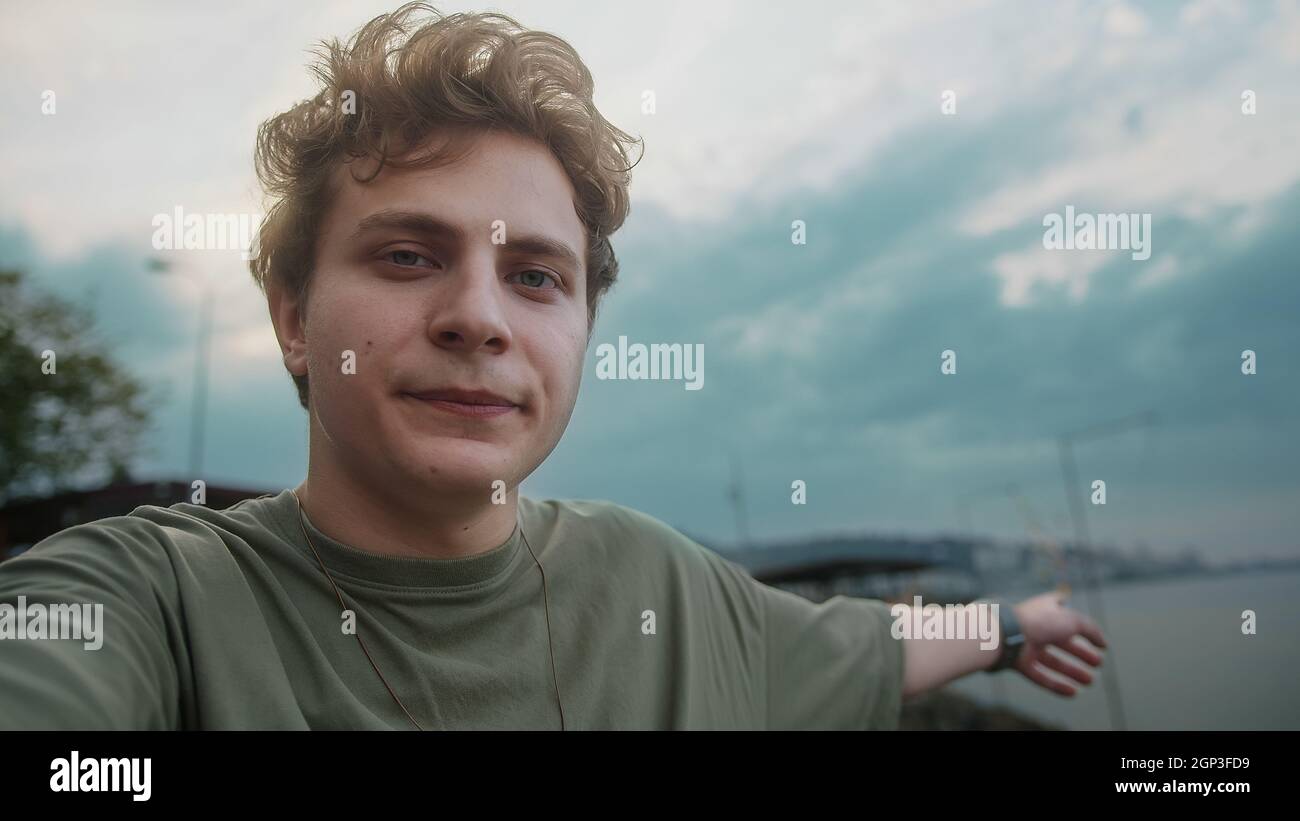 Young blond boy making video call and waving hand he say hello on ...