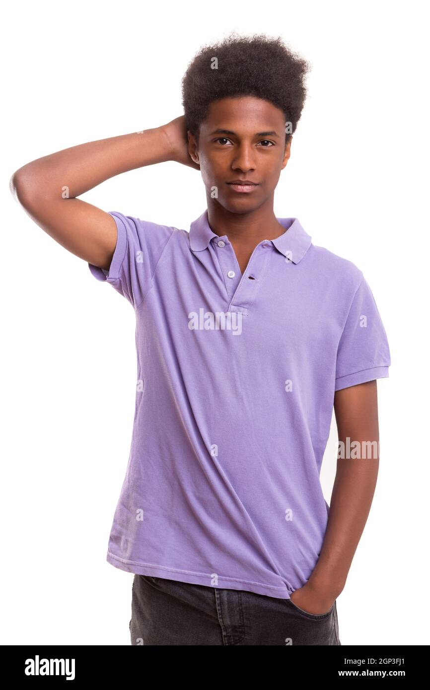 A casual young black boy posing isolated Stock Photo - Alamy
