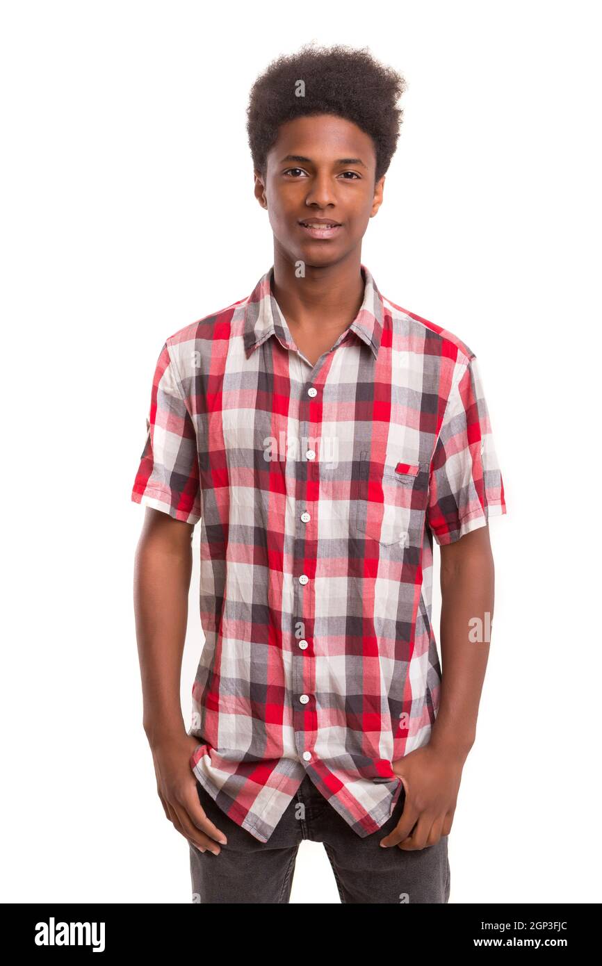 A casual young black boy posing isolated Stock Photo - Alamy