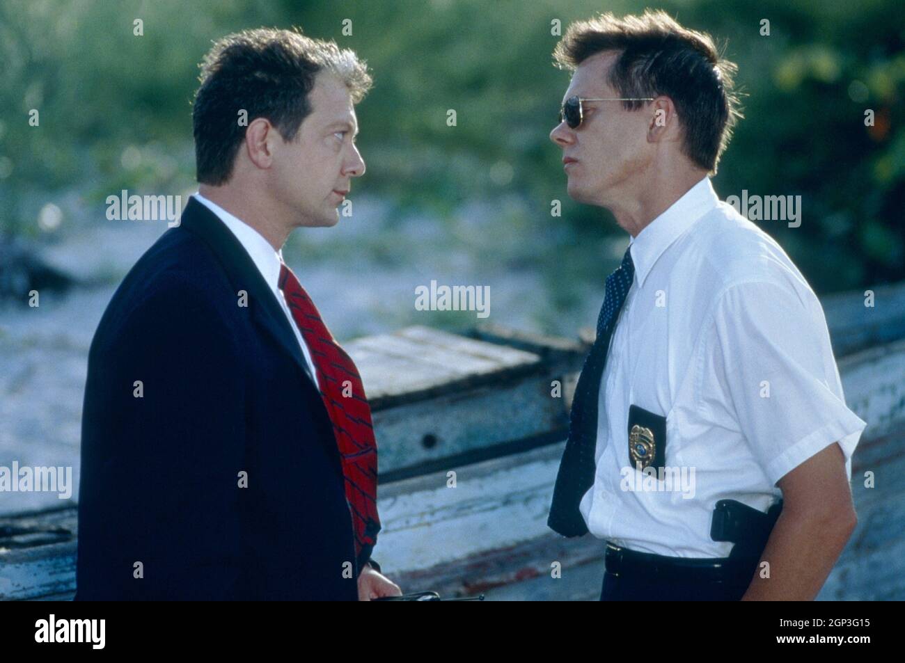 WILD THINGS, from left: Jeff Perry, Kevin Bacon, 1998. ph: © Columbia ...