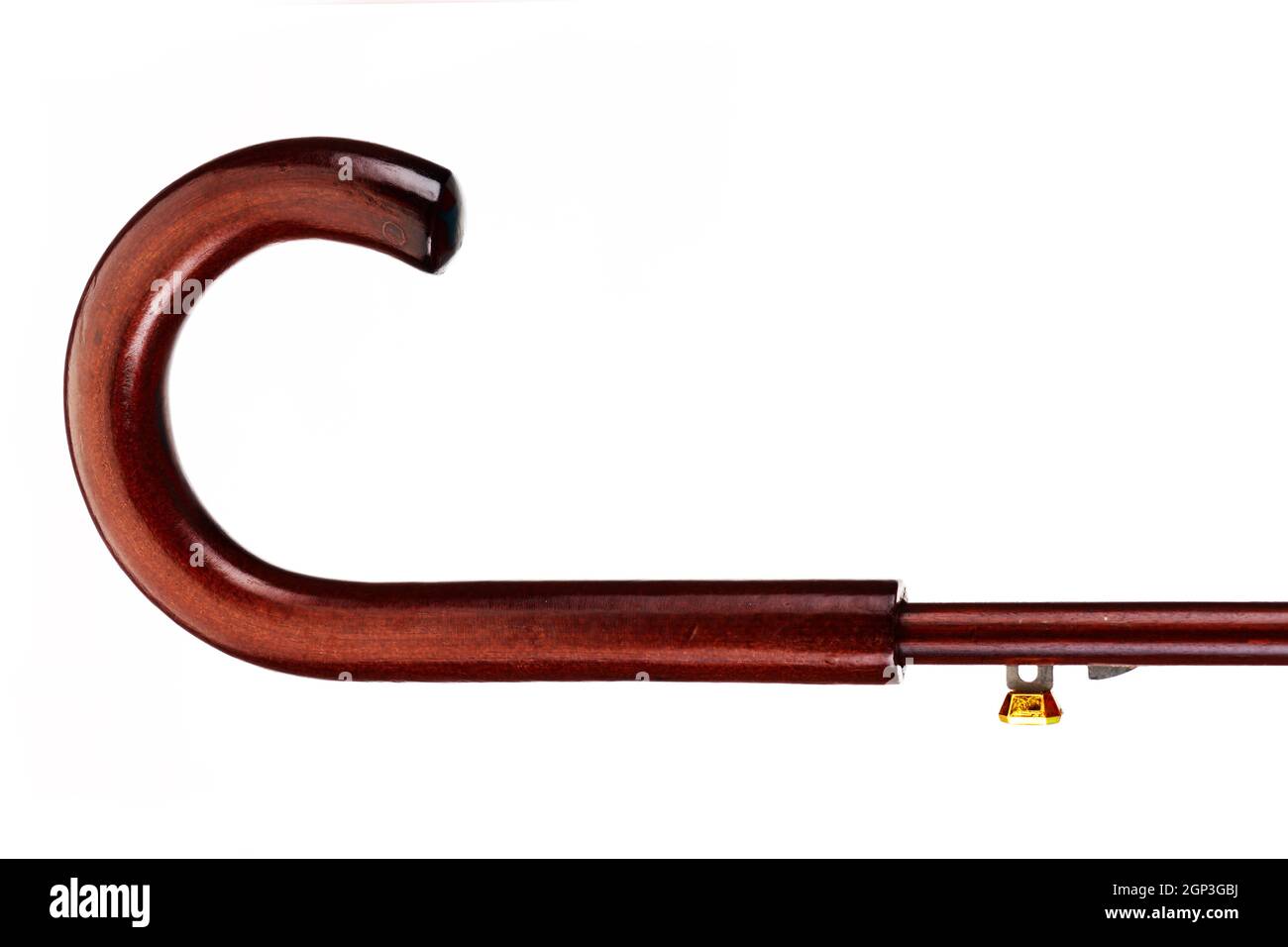 A dark wooden umbrella handle on white background Stock Photo - Alamy