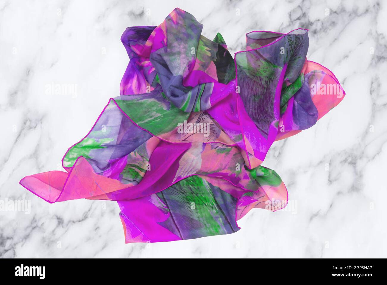 Silk shawl texture. Close-up of a beautifully folded multicolored silk ...