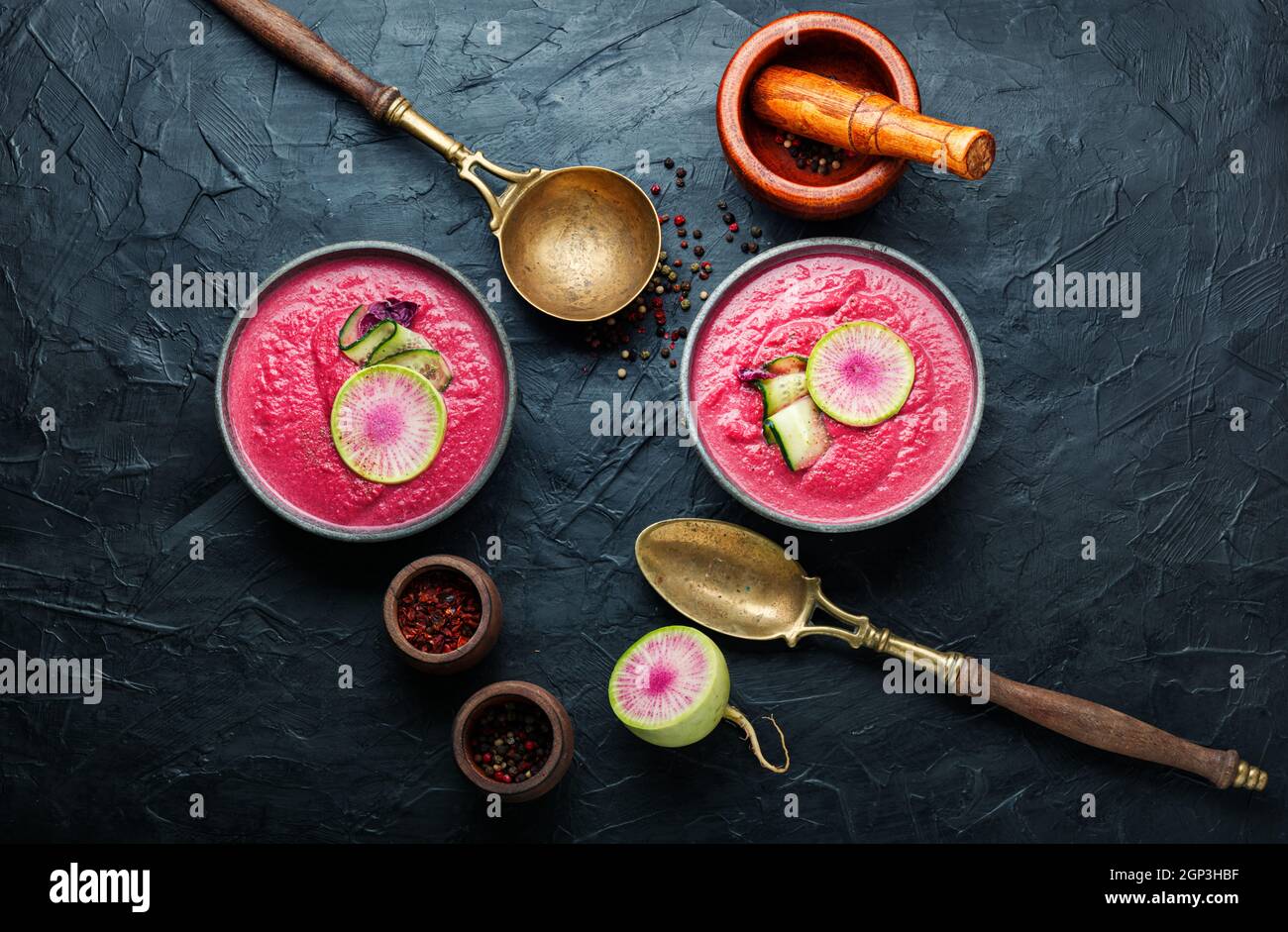 Gazpacho or cold beetroot puree soup with daikon.Vegan food.Top view ...