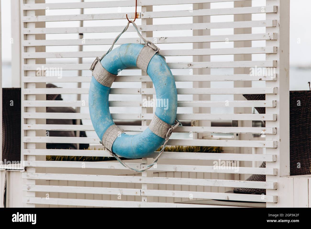 Old blue lifeline on the basis of rescuers. Lifeline to the sea Stock ...