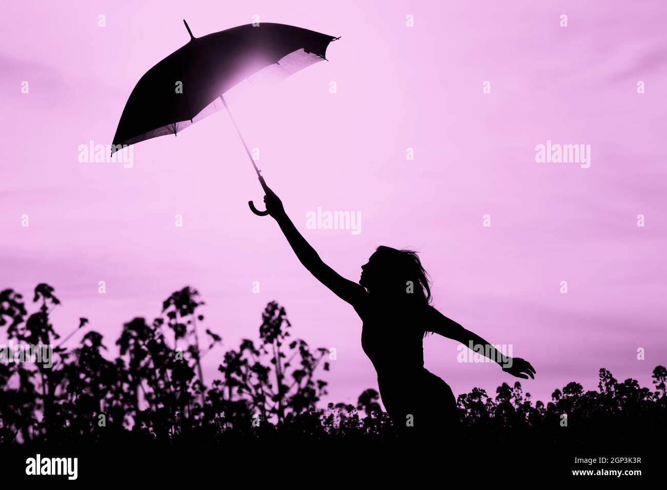 Nature girl at windy rainy day has adventure wanderlust. Wonderful ...