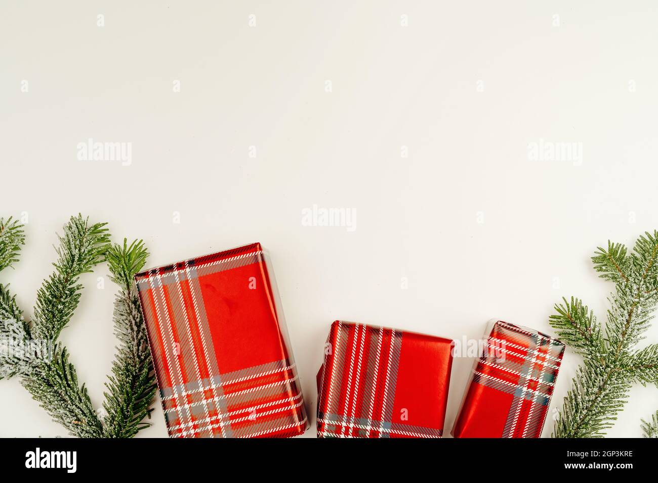 Top view, flat lay of red Christmas gifts on white background Stock ...