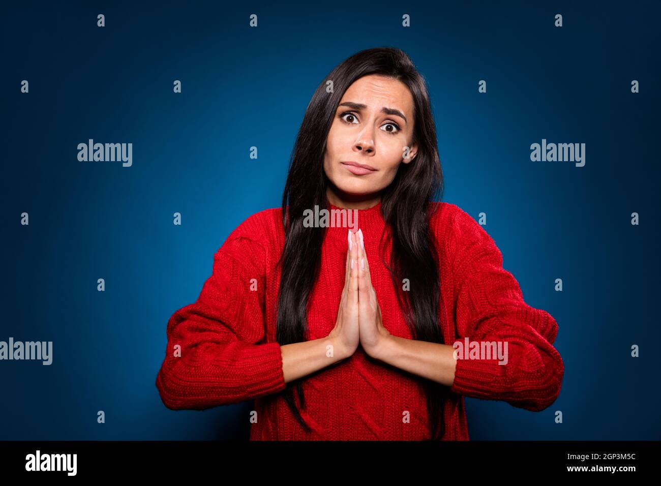 Photo of sweet guilty young lady wear knitted sweater arms together ...