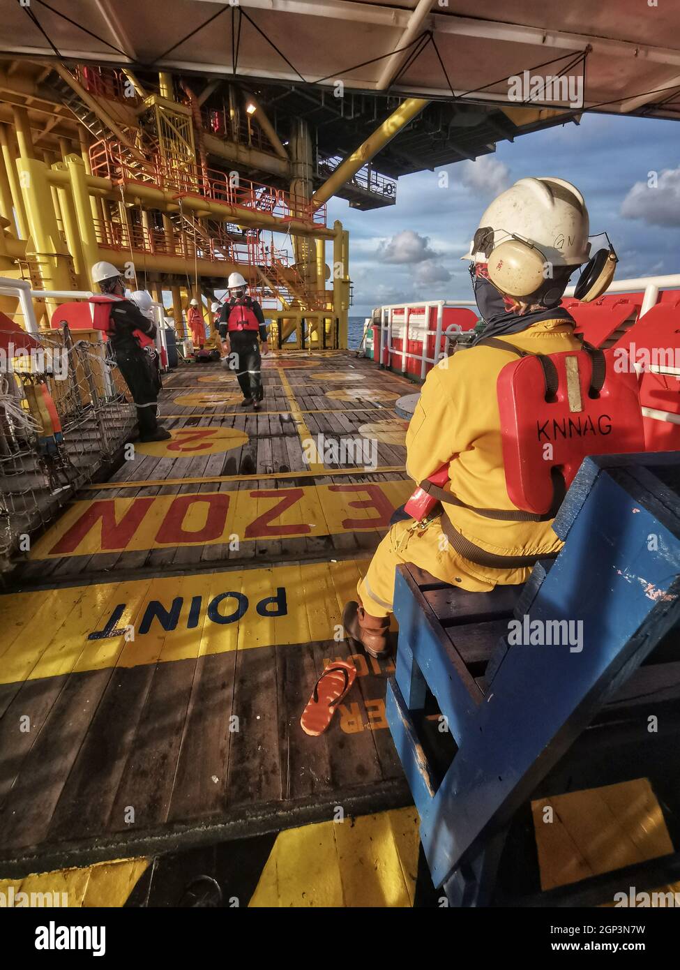 marine crew get ready to transfer oil platform personal to oil platform ...