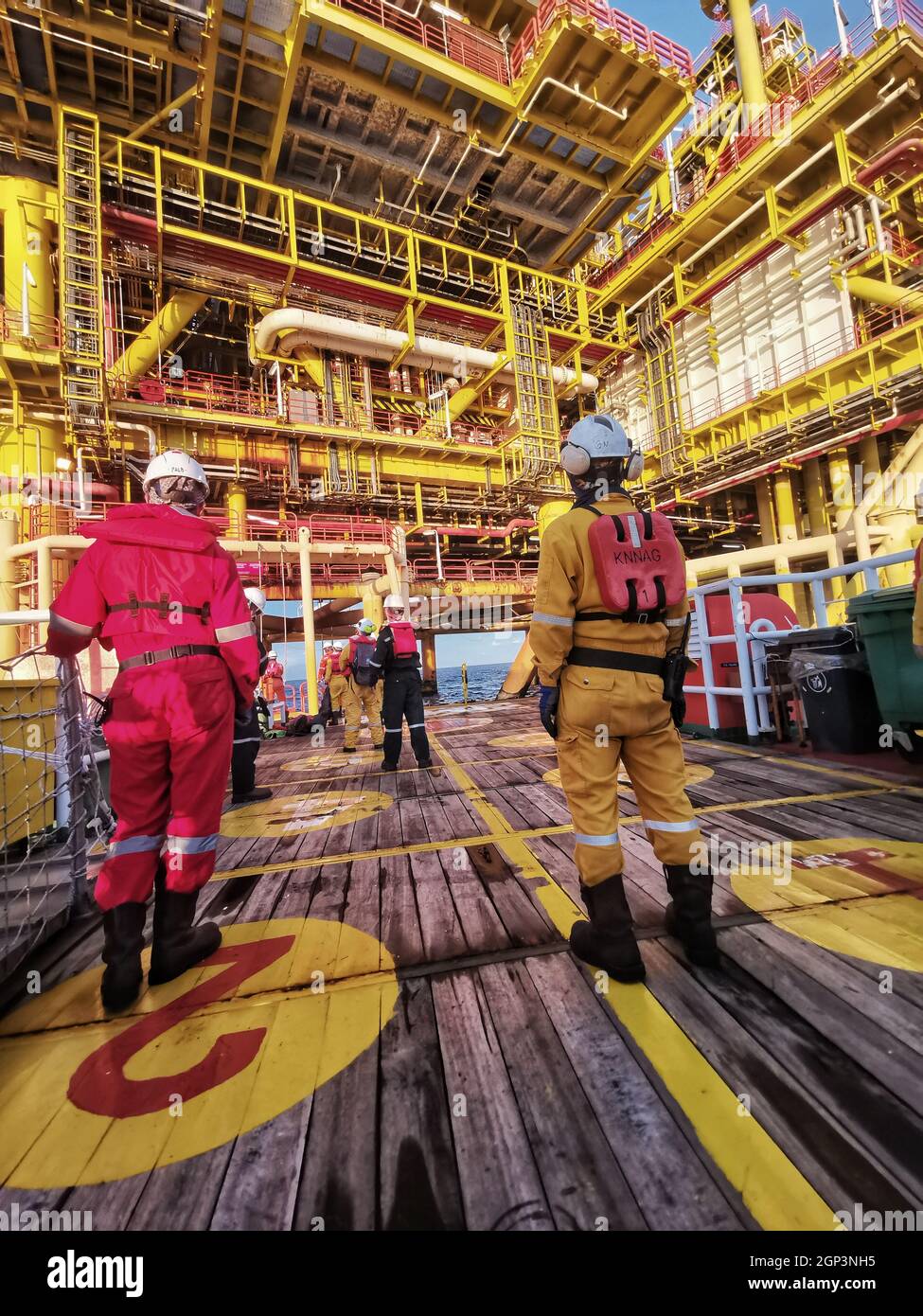 marine crew get ready to transfer oil platform personal to oil platform ...