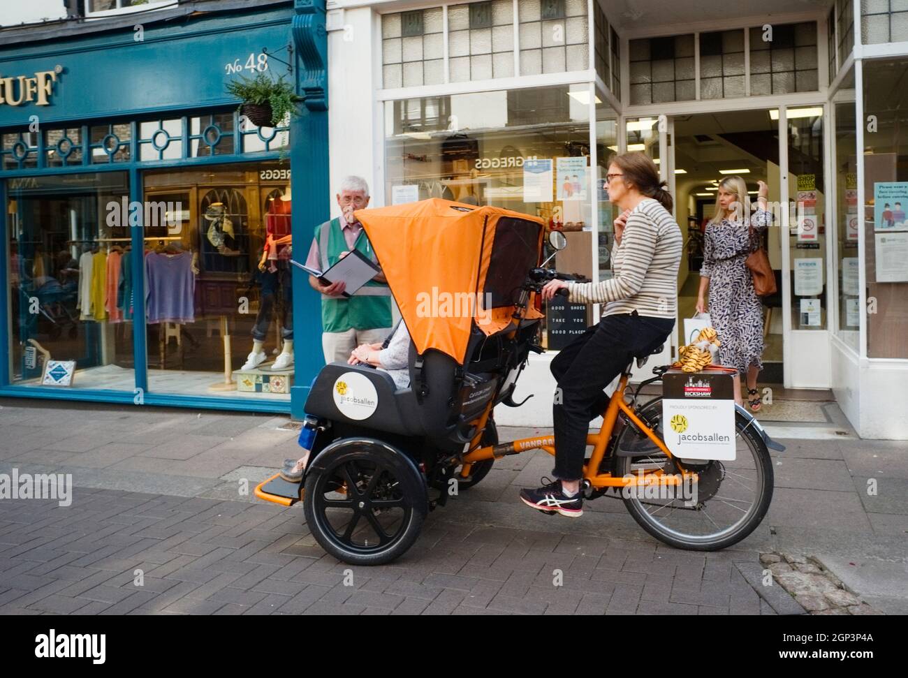 Electric powered tourist rickshaw in the central shopping area of Bury ...