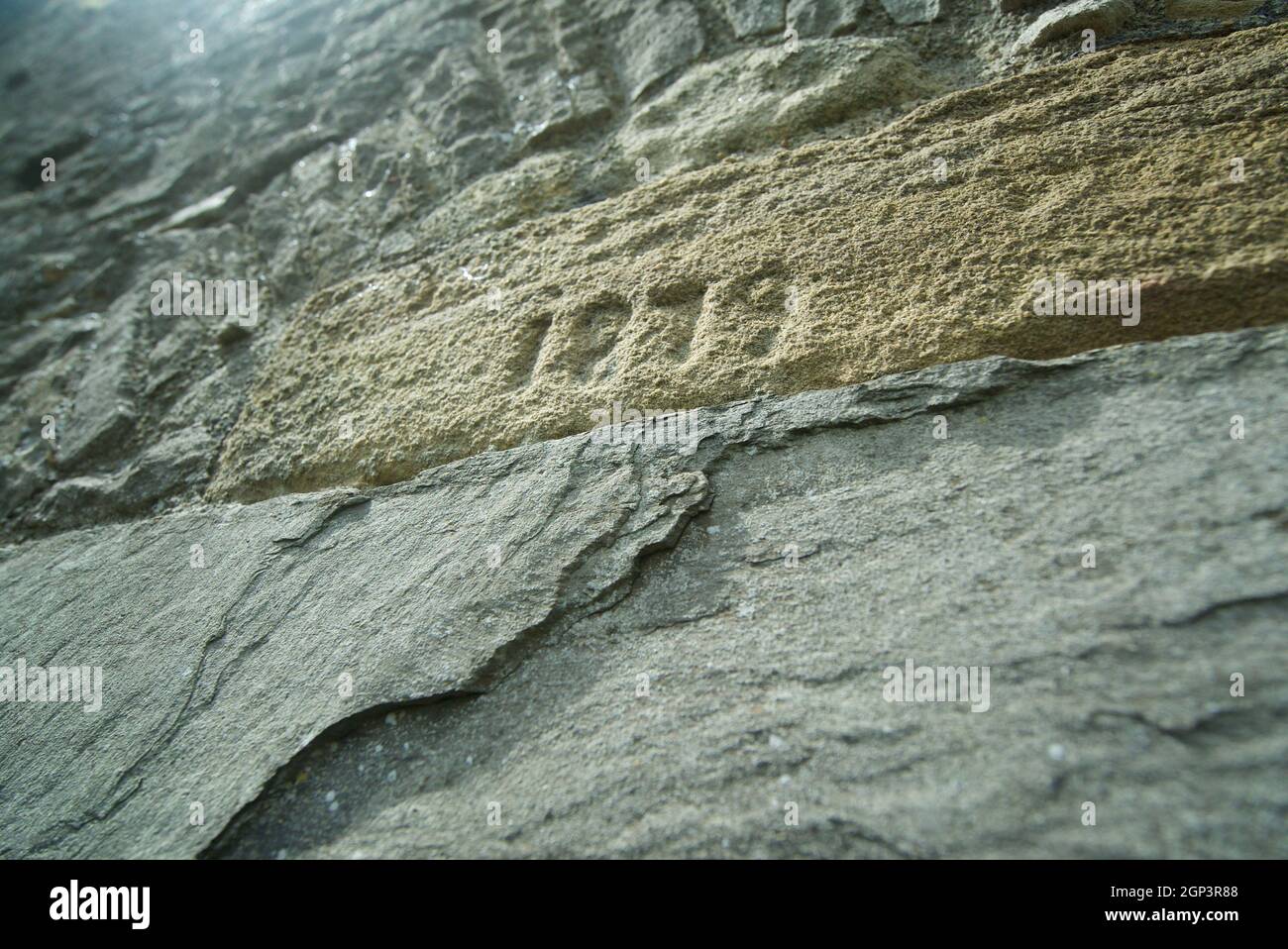 Brick inside an old building that says 1879. Old historical building ...