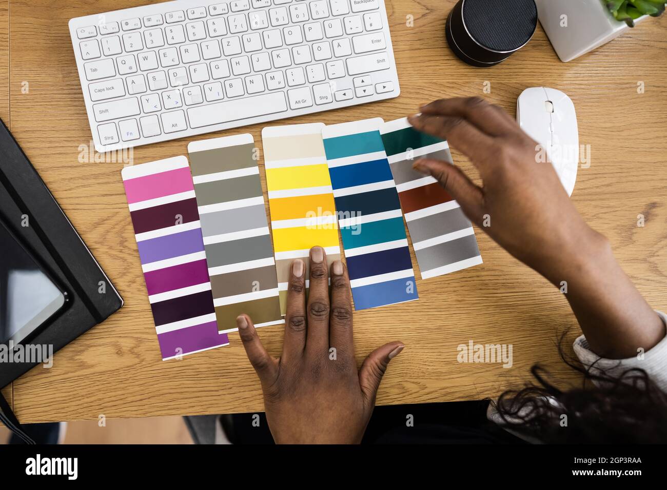 African American Graphic Designer Woman Choosing Coating Sample Stock ...