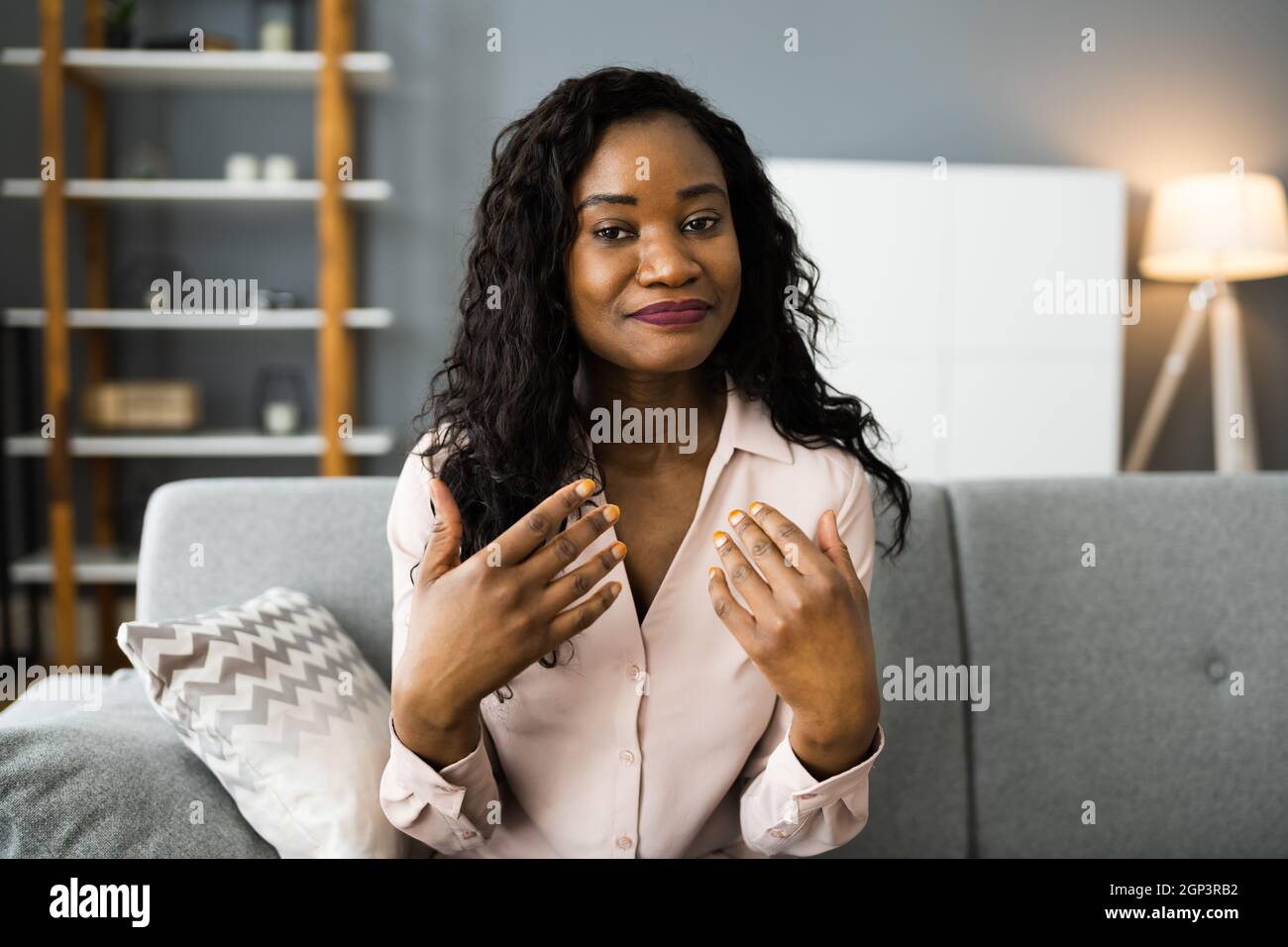 Adult Learning Sign Language For Deaf Disabled Stock Photo - Alamy
