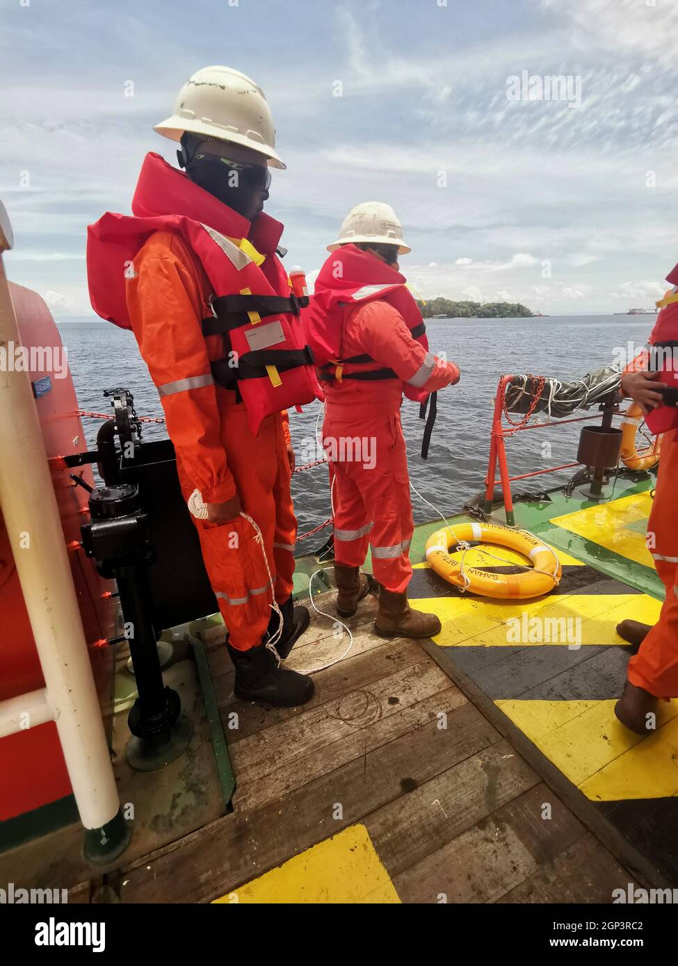 marine crew get ready to transfer oil platform personal to oil platform ...