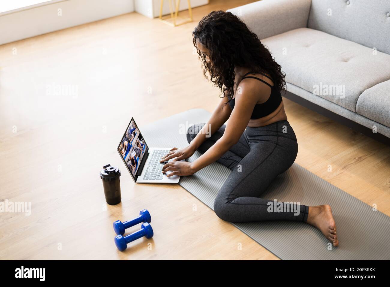 Watching Online Yoga Video Program Exercise On Laptop Computer At Home ...