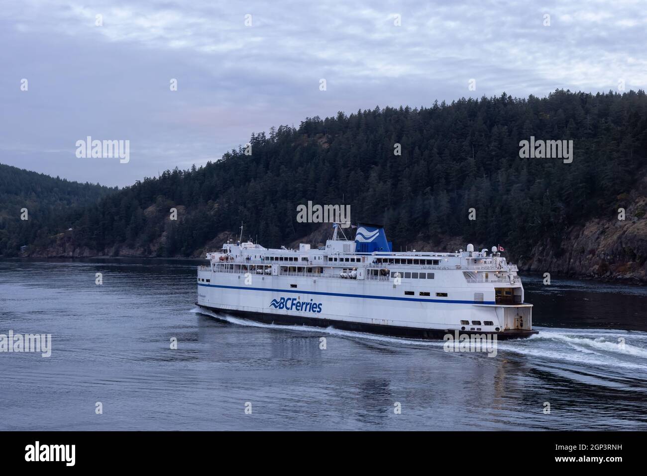 BC Ferries Boat in Pacific Ocean during cloudy summer morning sunrise ...
