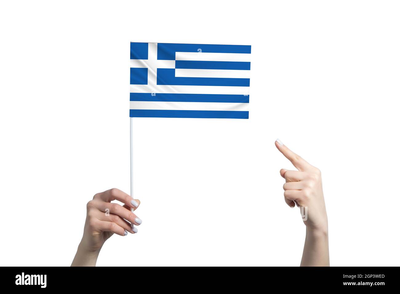 A beautiful female hand holds a Greece flag to which she shows the ...