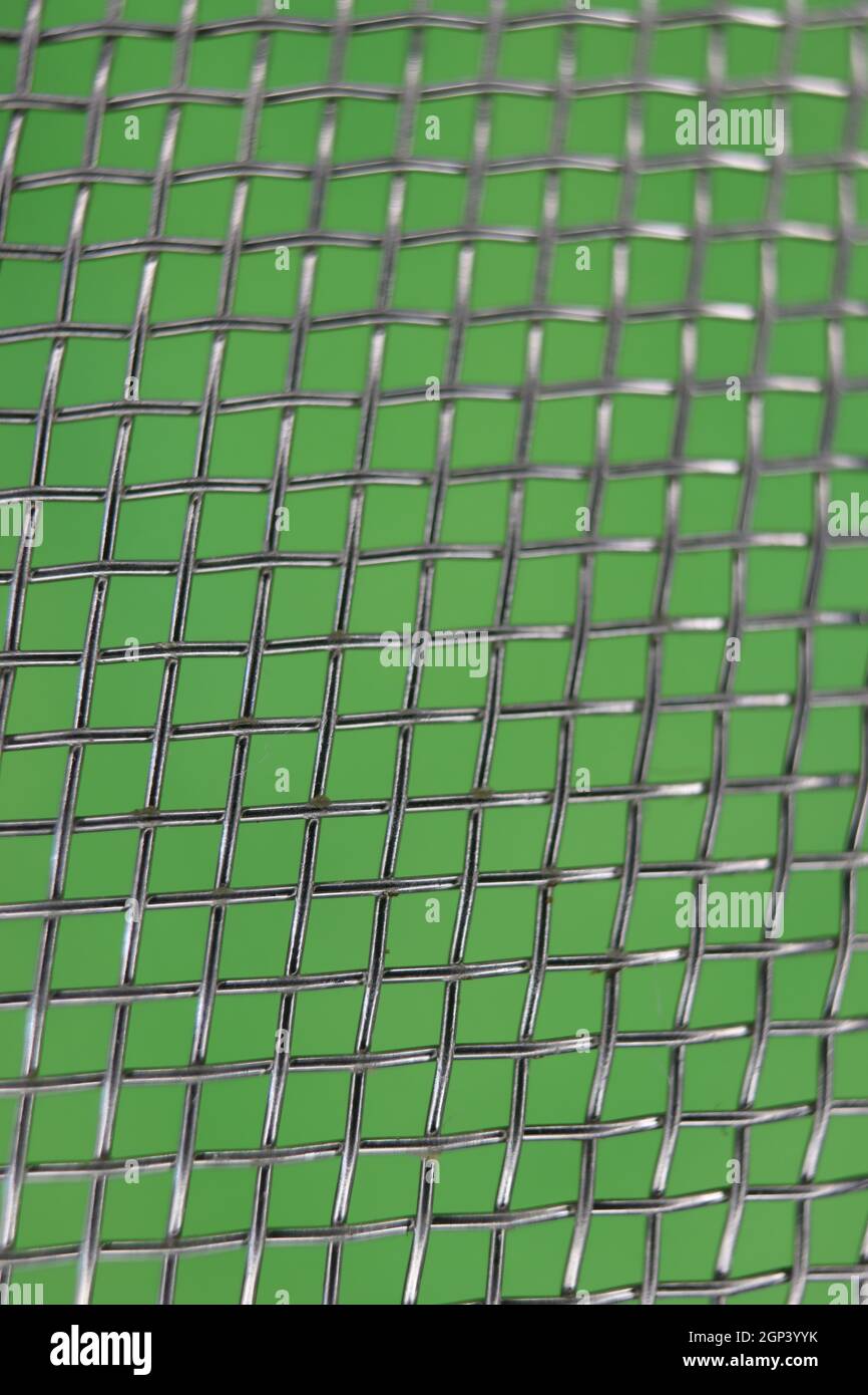 beautiful macro photo of an abstract metal kitchen strainer background ...