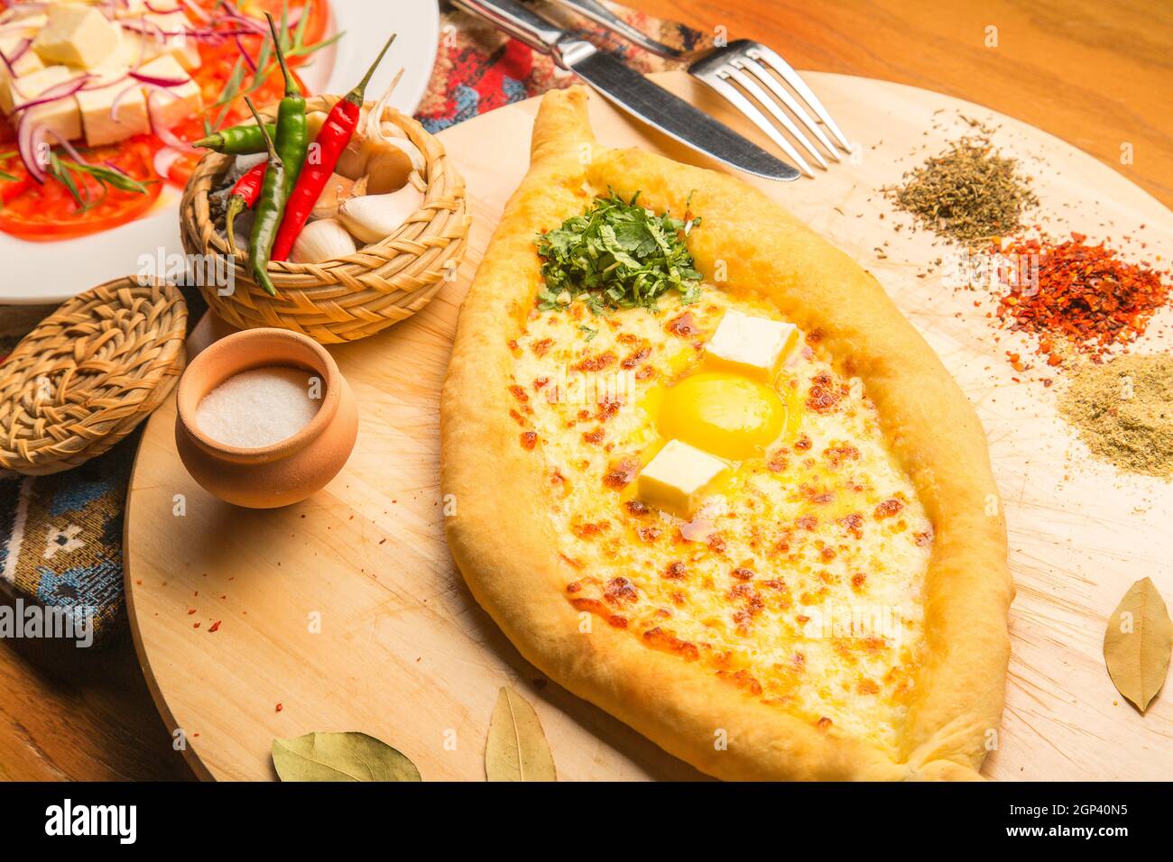 Hot Georgian bread with butter and egg yolk. Home-made national ...