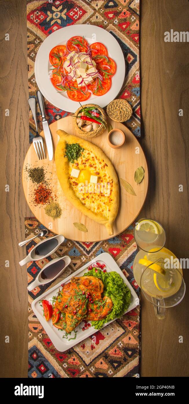 Georgian flat bread and the garlic chicken and tomato salad, goat ...