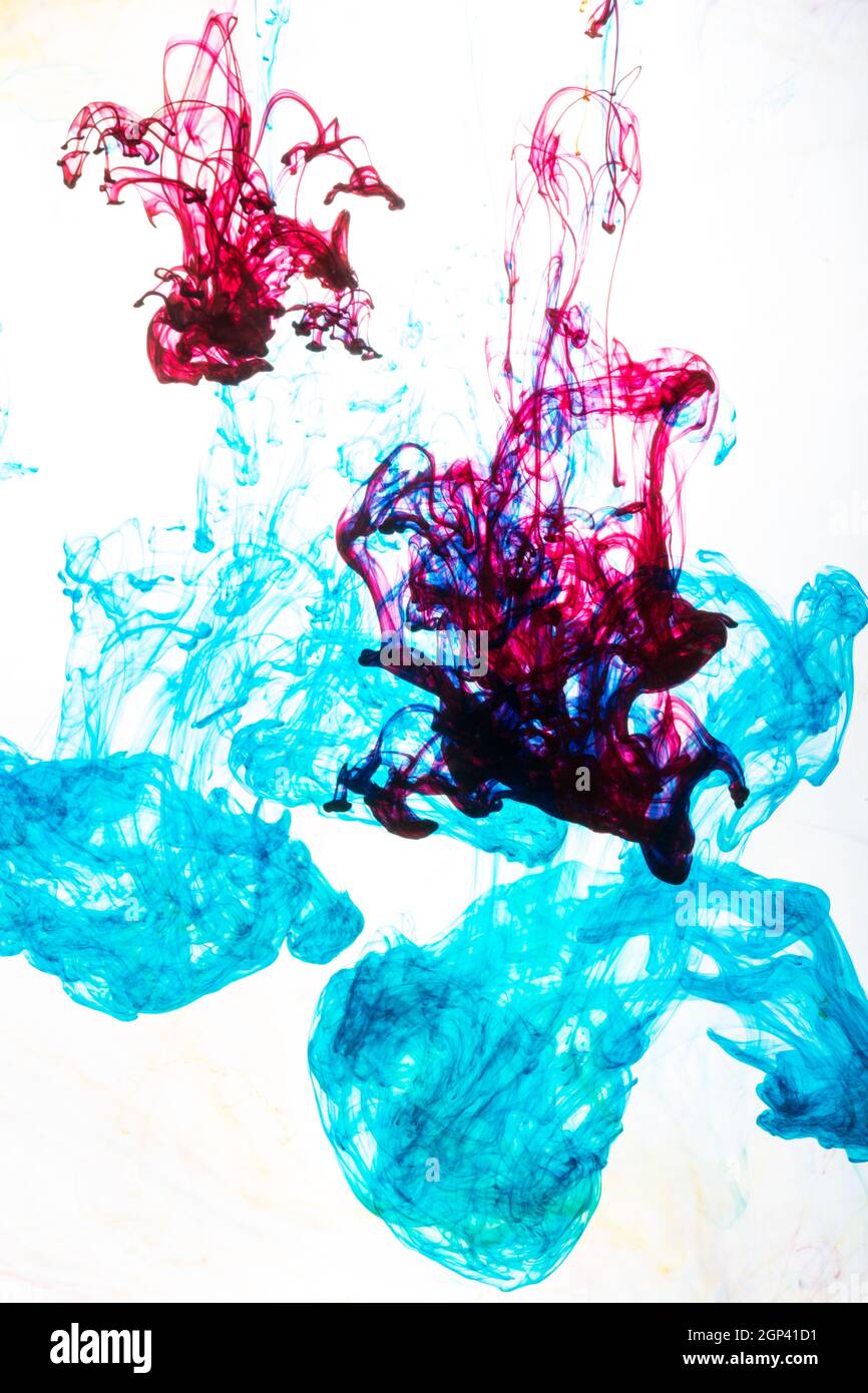 Acrylic colors and ink in water. Abstract background Stock Photo - Alamy